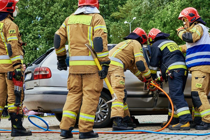 Firefighters Use Hydraulic Tools during a Rescue Operation Training ...