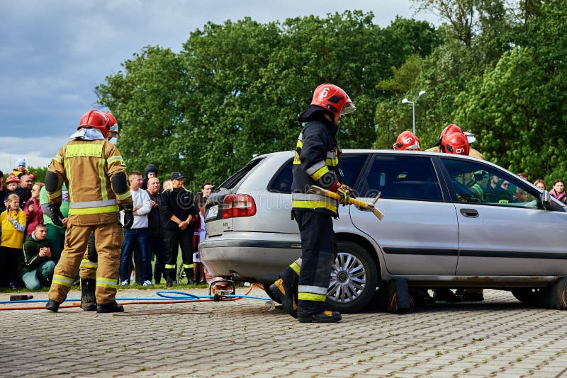 Firefighters Use Hydraulic Tools during a Rescue Operation Training ...