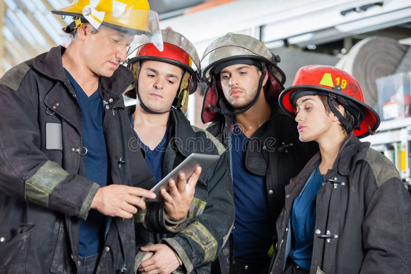 Firefighters Using Tablet Computer Stock Image - Image of education ...