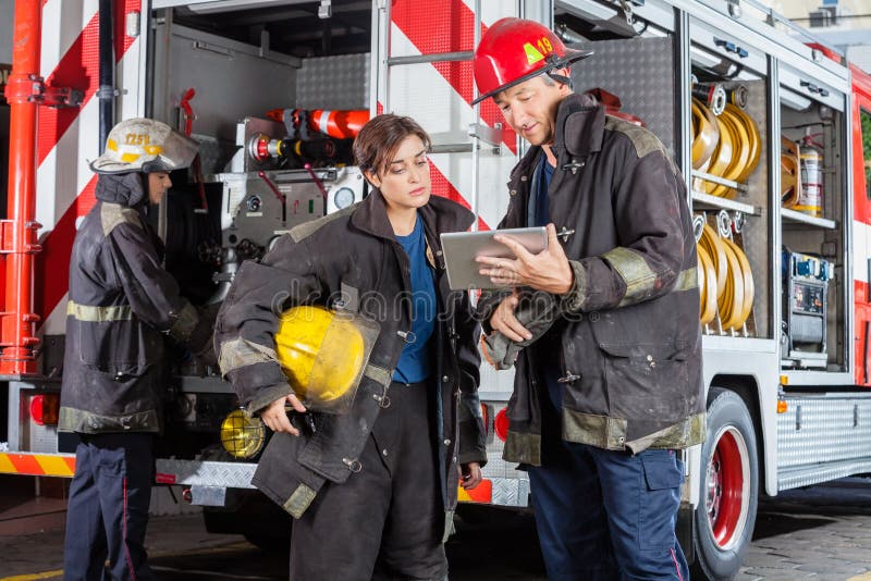 Firefighters Using Tablet Computer Stock Image - Image of firefighter ...