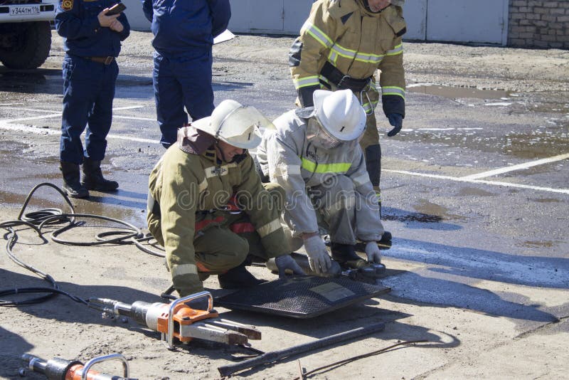 Firefighters at work. editorial photography. Image of extinguishing ...