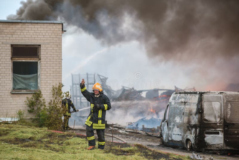 Firefighters at work editorial image. Image of burn, heat - 58810515