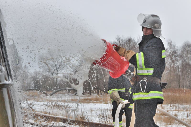 Firefighters at work editorial stock photo. Image of protective - 61257898