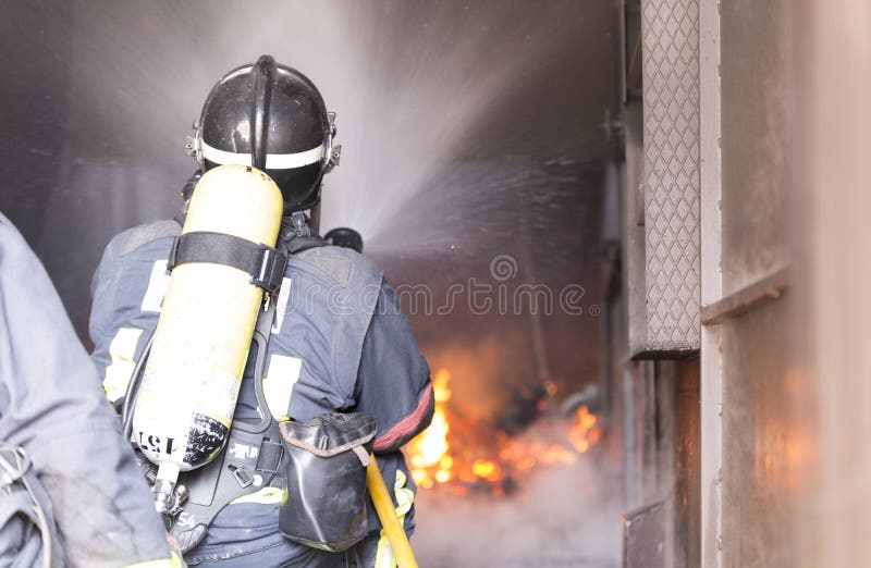 Firefighters working stock photo. Image of flashover - 78194494