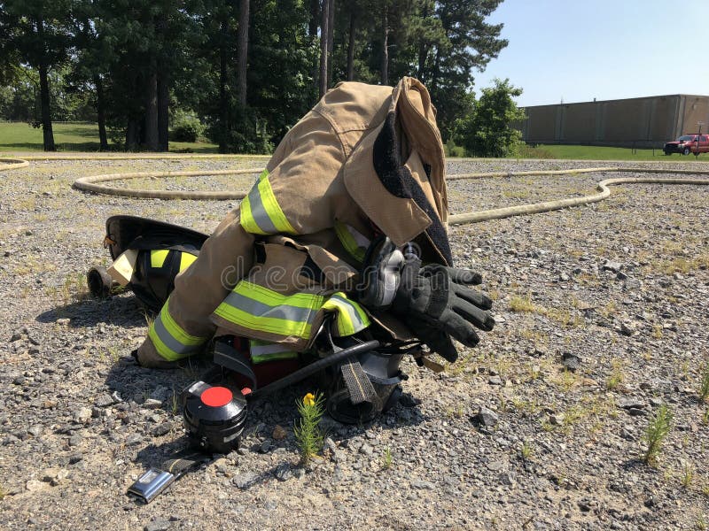 Firefighter Coat and Helmet Ready To Go Stock Photo - Image of ...