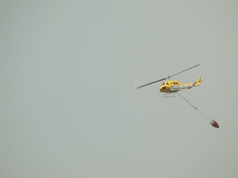 Firefighting helicopter editorial image. Image of wild - 83589775