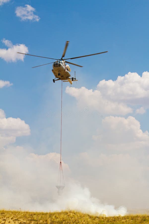 Firefighting Helicopter with Fire Bucket Flies Stock Image - Image of ...