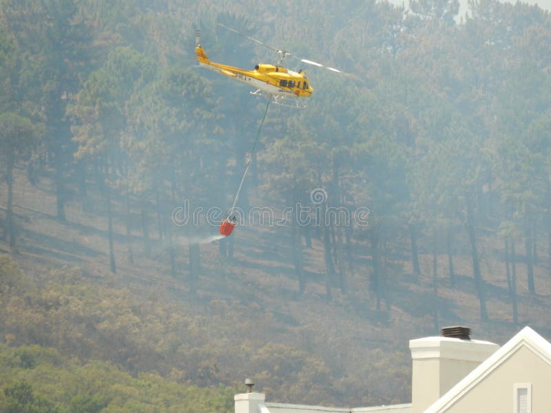 Firefighting helicopter editorial image. Image of yellow - 83593970