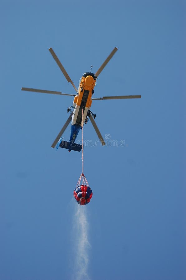 Helicopter over fire stock image. Image of explosive - 11642875
