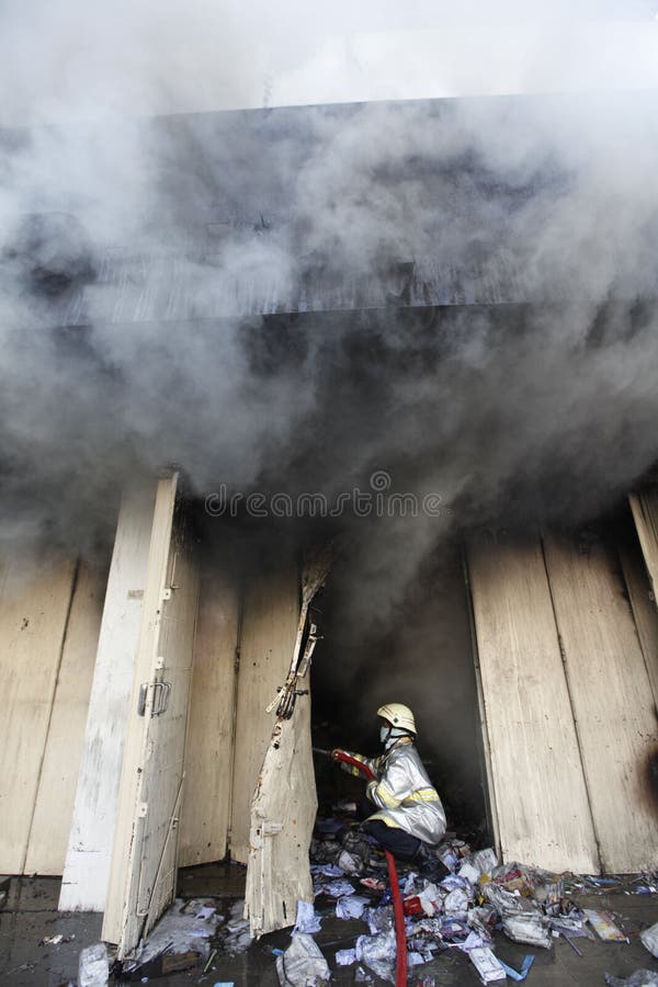 Firefigther editorial stock photo. Image of burn, central - 40035908