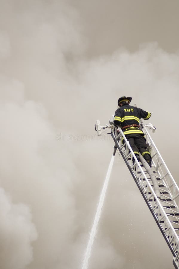 Firefighter on Ladder stock photo. Image of fighter, ladder - 7903350