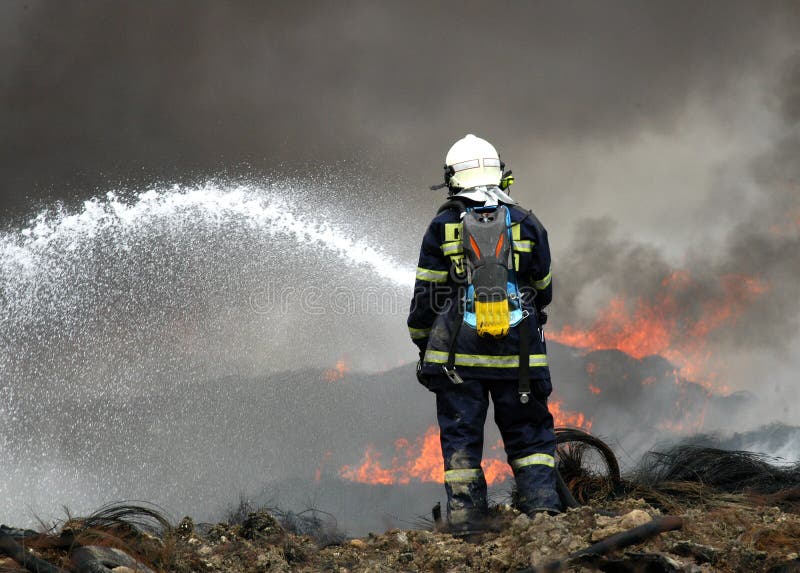 Fireman Working stock image. Image of smoke, flame, drag - 1780743