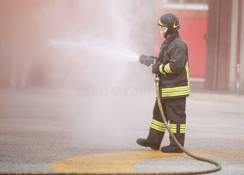 Fireman in action stock photo. Image of public, insurance - 9611944