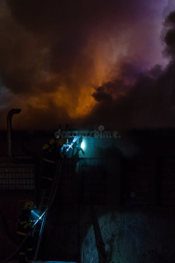 Fireman in action editorial stock image. Image of night - 138290584