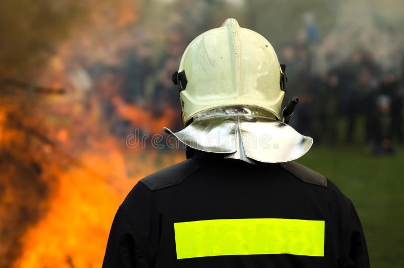 Fireman on the Back of Forest Fire Stock Photo - Image of emergency ...
