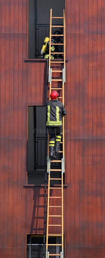 Fireman Ladder Stock Photos - Download 2,053 Royalty Free Photos
