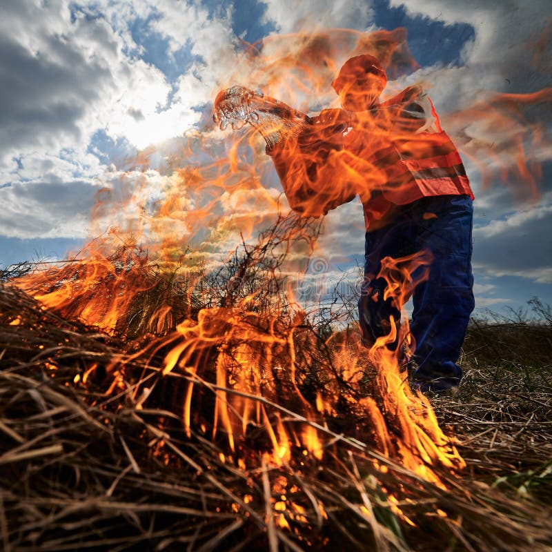 Fireman Ecologist Fighting Fire in Field Stock Image - Image of ...