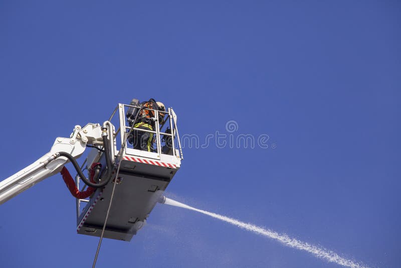 Fireman on an Extended Boom Stock Photo - Image of danger, rescue: 40991780