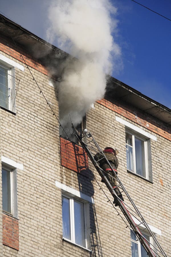 Fireman Extinguish Fire in a High-rise Apartment Stock Image - Image of ...