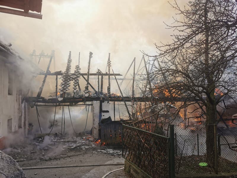 Fireman Fighting a Fire in House Stock Image - Image of inferno, damage ...