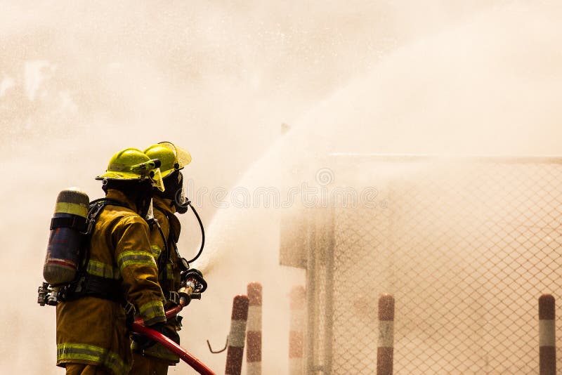 Fireman on the fire stock photo. Image of adult, protection - 143254878