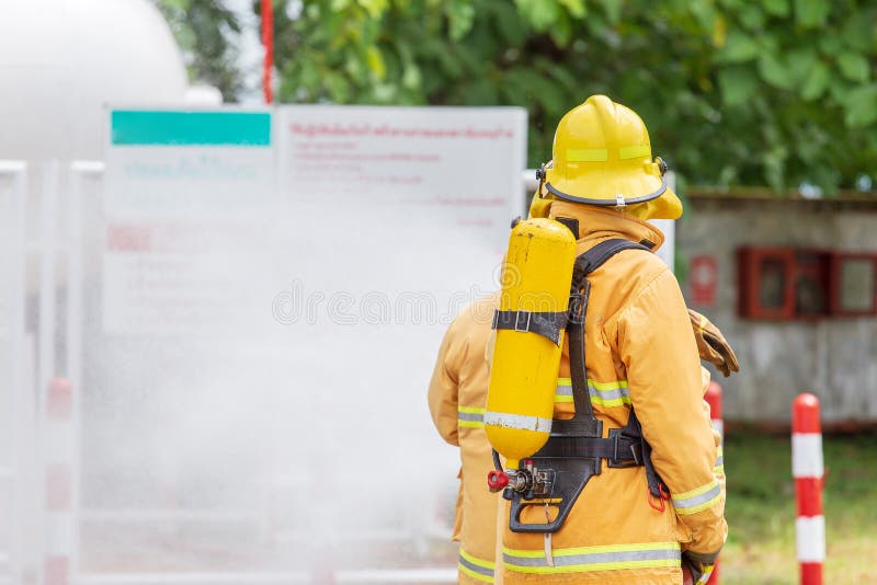Fireman on the fire stock image. Image of equipment - 143852949