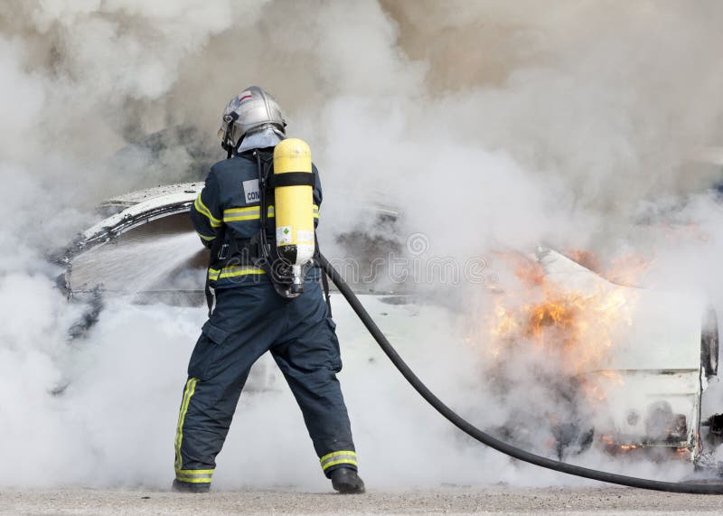 Firefighter in action stock image. Image of flame, flames - 35271931