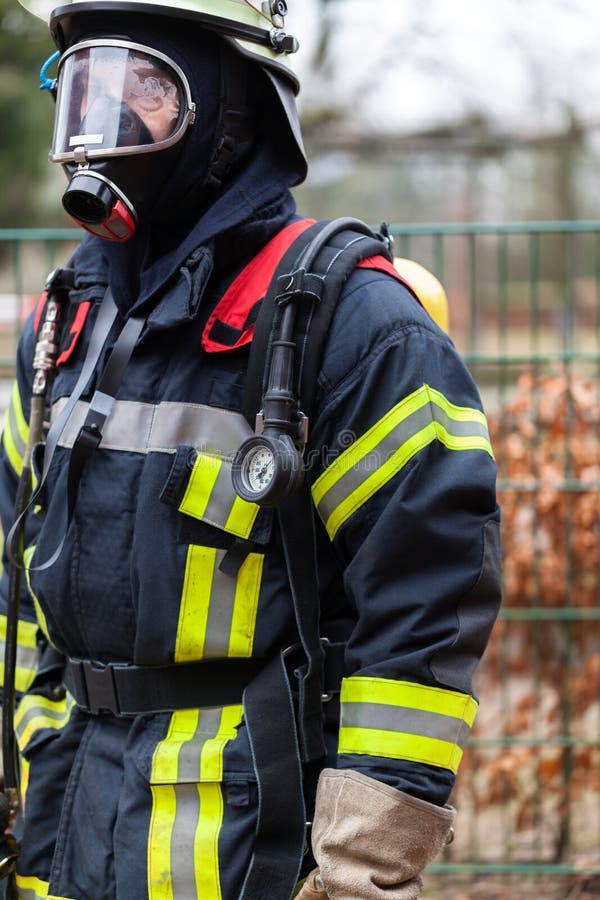 Fireman with Fireproof Clothing and Respirator Stock Image - Image of ...