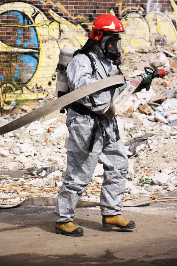 Fireman in Light Protective Suit Editorial Stock Image - Image of ...