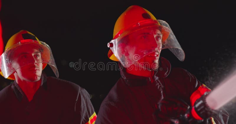 Night Shift of Firefighters Extinguishing the Blaze Stock Video - Video ...