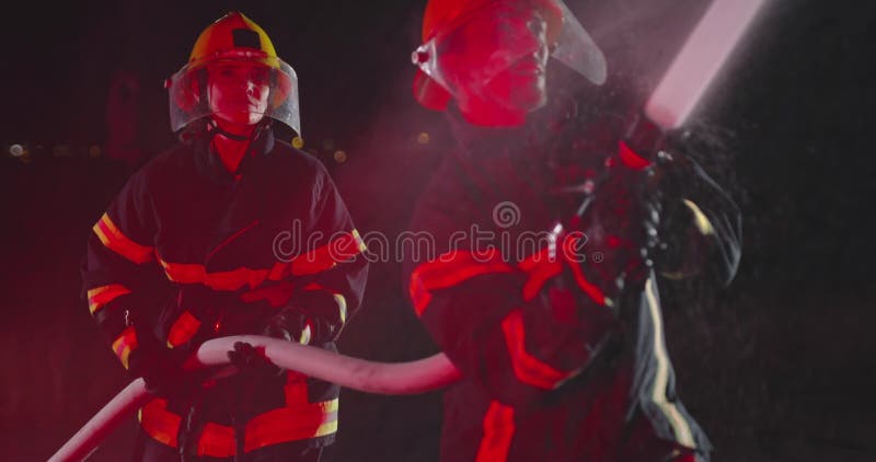 Night Shift of Firefighters Extinguishing the Blaze Stock Footage ...