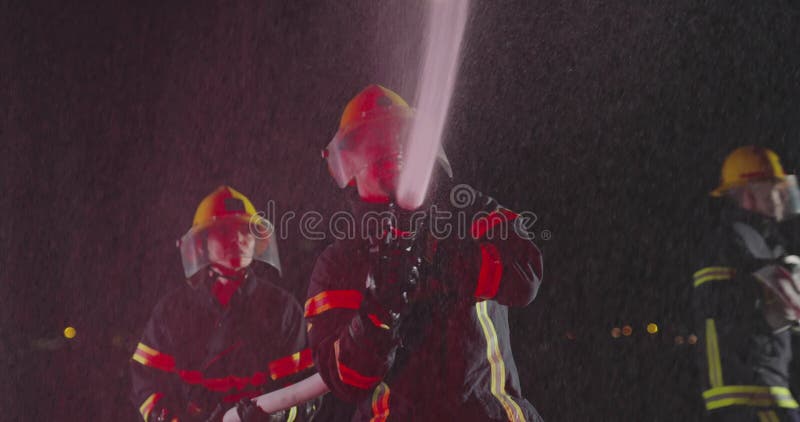 Night Shift of Firefighters Extinguishing the Blaze Stock Footage ...