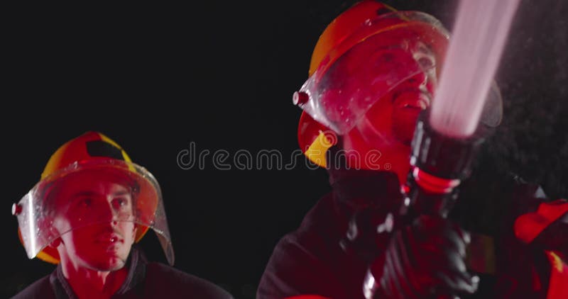 Night Shift of Firefighters Extinguishing the Blaze Stock Footage ...