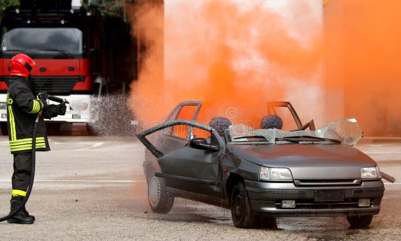 Fireman while Off a Fire of a Car Stock Photo - Image of firefighters ...