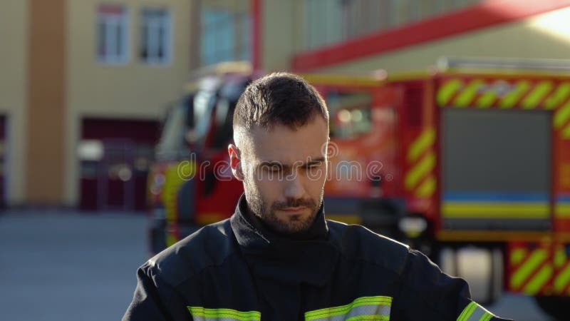 Fireman Removes the Protective Helmet at Fire Station Stock Footage ...