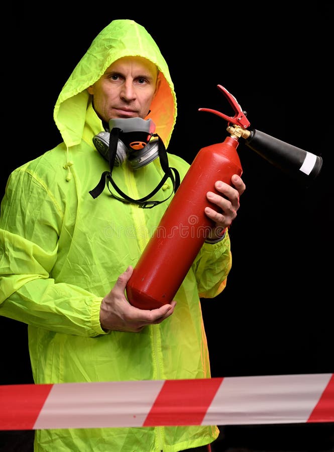 Fireman Attacking a Fire with Extinguisher Stock Image - Image of adult ...