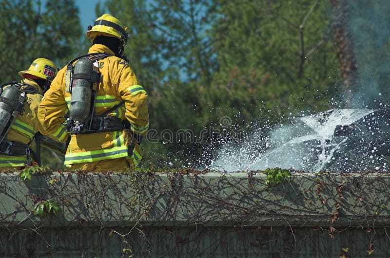 Fireman at Scene of Car Fire Stock Image - Image of extinguishers ...