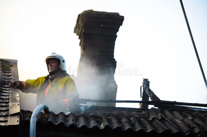 A Fireman at a House Fire in Downtown Toledo Editorial Stock Photo ...