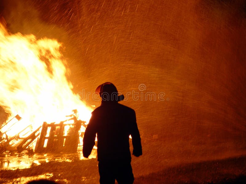 Fireman sprayed stock photo. Image of ocupation, rain, bonfire - 120250