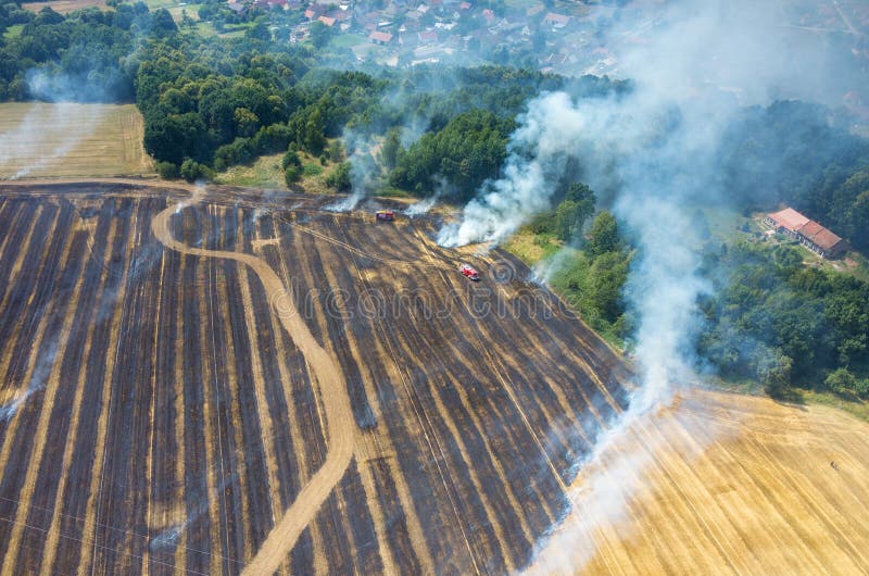 Fireman Truck Working on the Field on Fire Stock Photo - Image of land ...