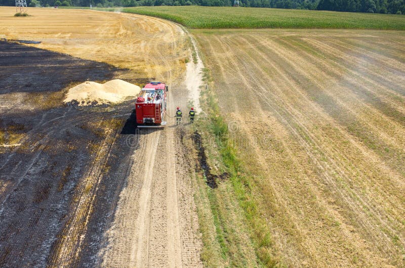 Fireman Truck Working on the Field on Fire Stock Photo - Image of drama ...