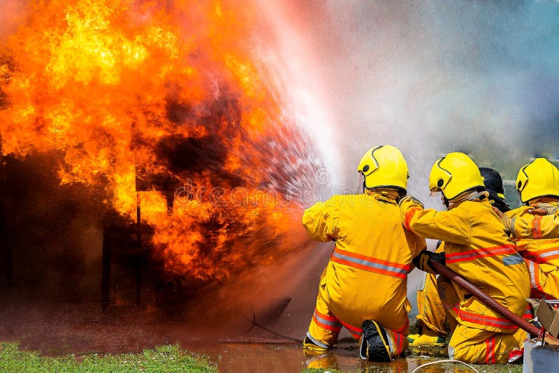Fireman Using Water and Extinguisher,fireman Using Water and ...