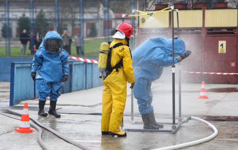Firemen in action stock photo. Image of firefighter, fire - 19572410