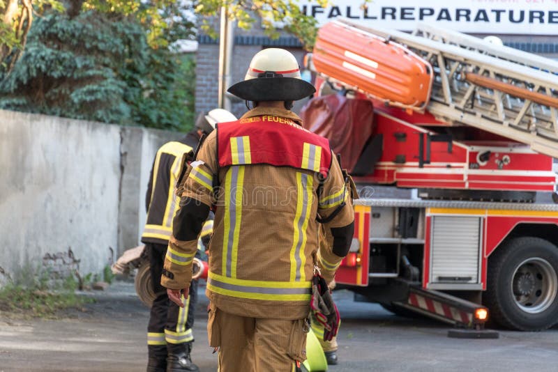 Firemen in action stock photo. Image of firefighter, fire - 19572410