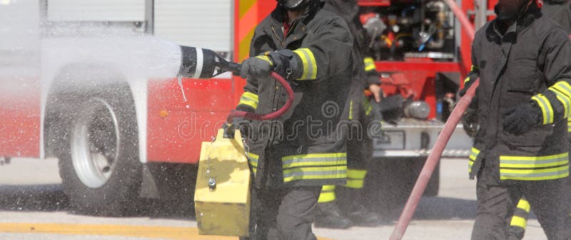 Firemen with the Fire Extinguisher during a Practice Session at Stock ...
