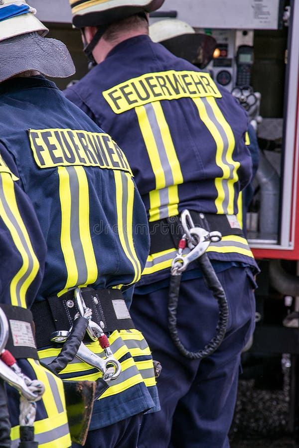 Firemen in Firefighter Uniform are Keep Their Equipment after Us Stock ...