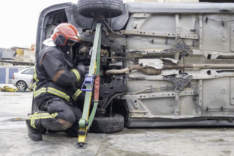 Firemen Practicing Rescue Techniques in Traffic Accidents Editorial ...