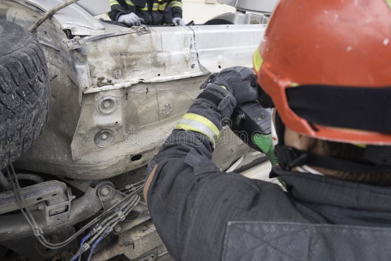 Firemen Practicing Rescue Techniques in Traffic Accidents Editorial ...