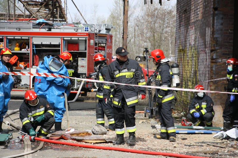 Firemen in action! editorial stock image. Image of heavy - 70095509