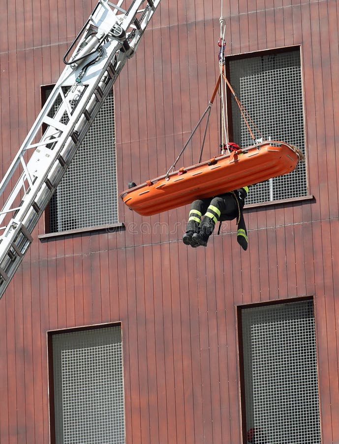 Rescue with Stretcher on the Aerial Platform during a Fire Drill Stock ...